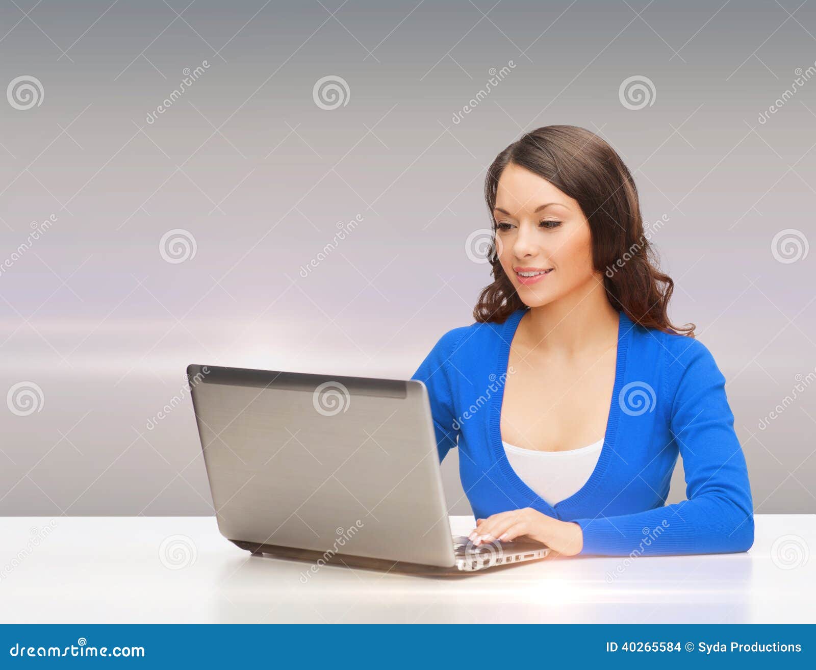 Smiling Woman in Blue Clothes with Laptop Computer Stock Photo - Image ...