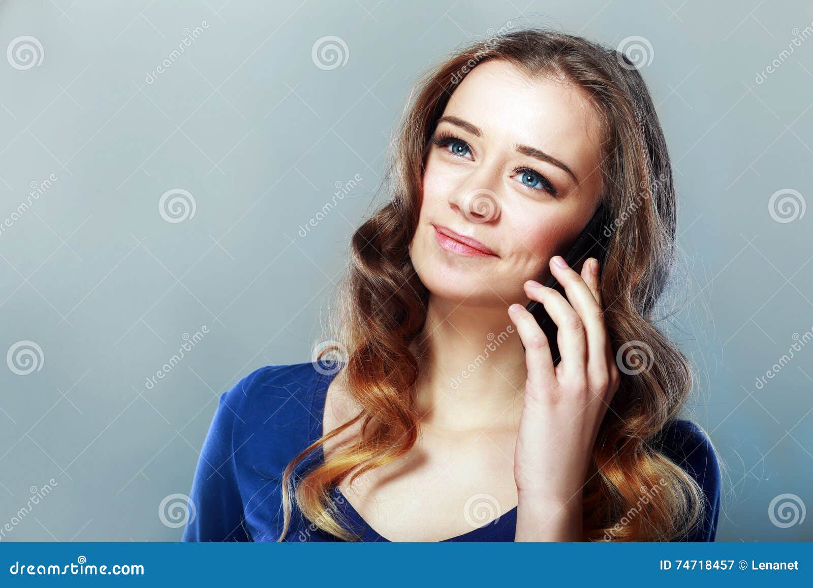 Smiling woman calling stock image. Image of face, elegance - 74718457