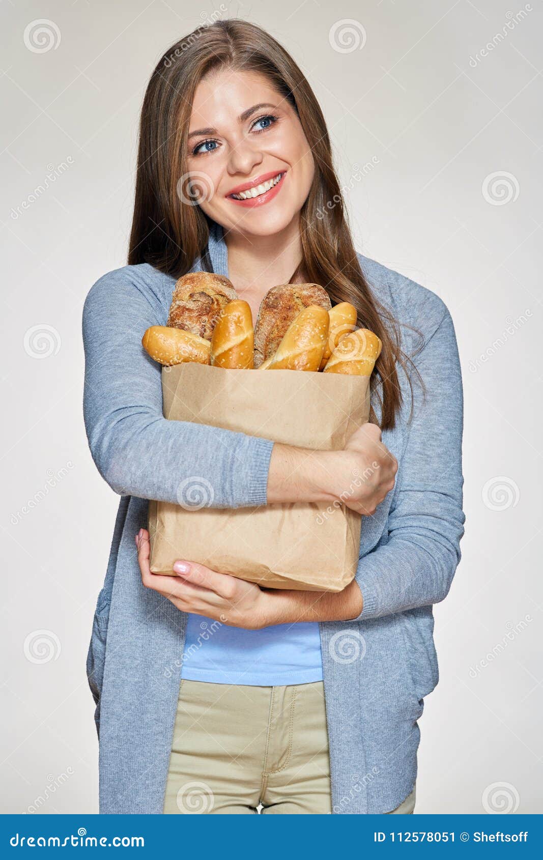 Smiling Woman Casual Style Dressed Holding Shopping Bag with Bread ... Smiling Woman Casual Style Dressed Holding Shopping Bag with Bread ...