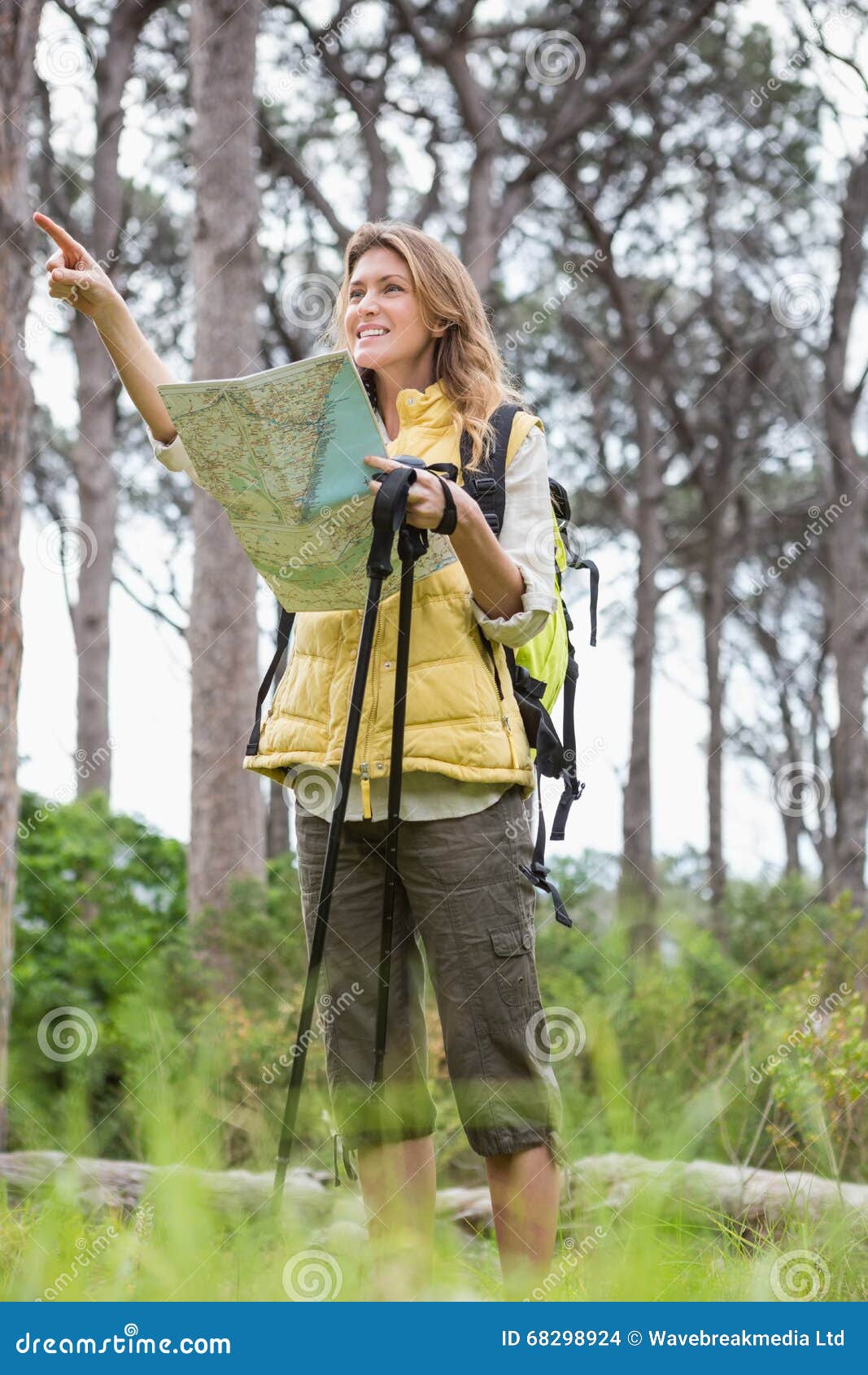 Smiling Woman Checking the Map Stock Photo - Image of hike, exploration ...