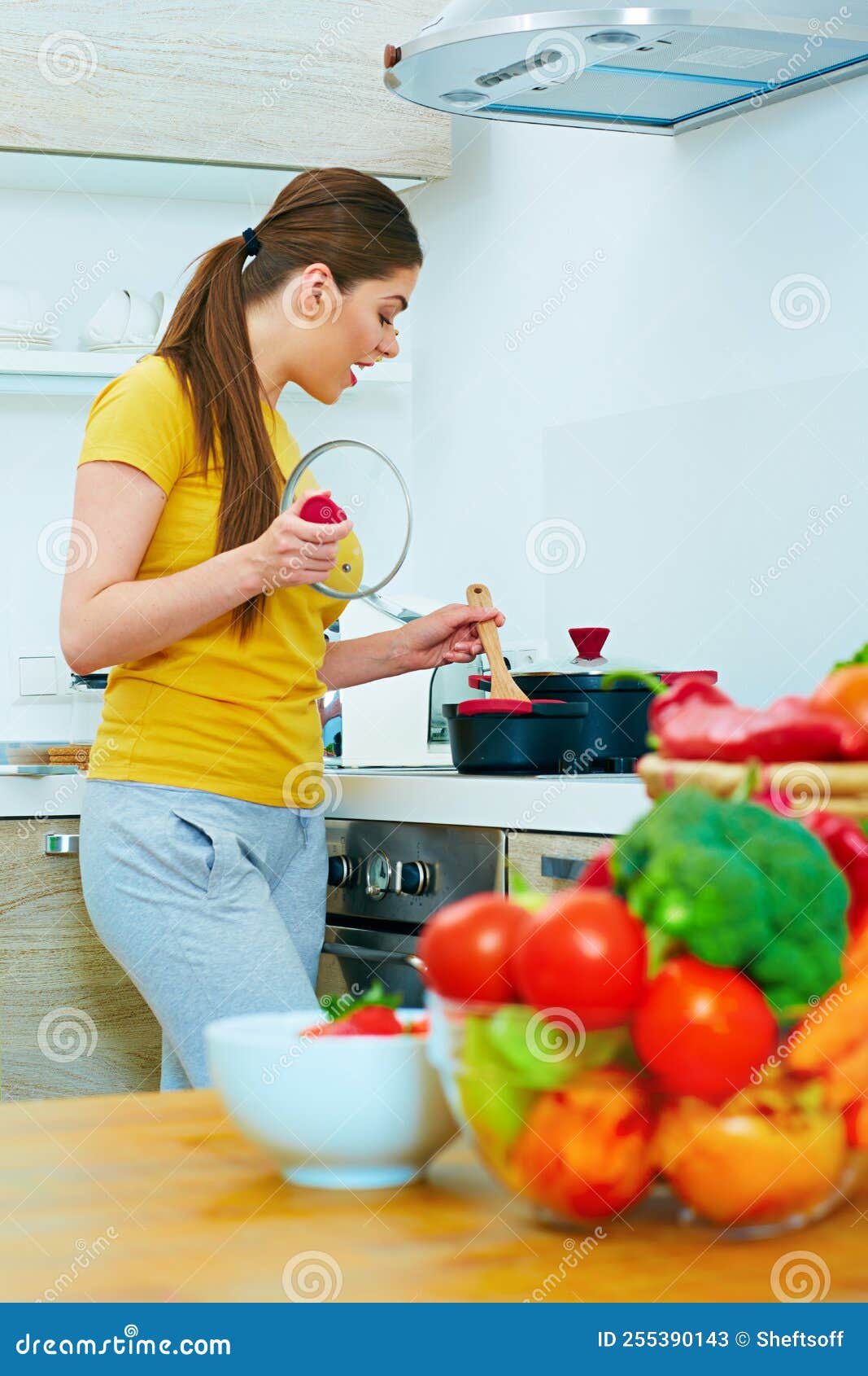 Smiling Woman Cooking in Kitchen with Fun Stock Image - Image of ...