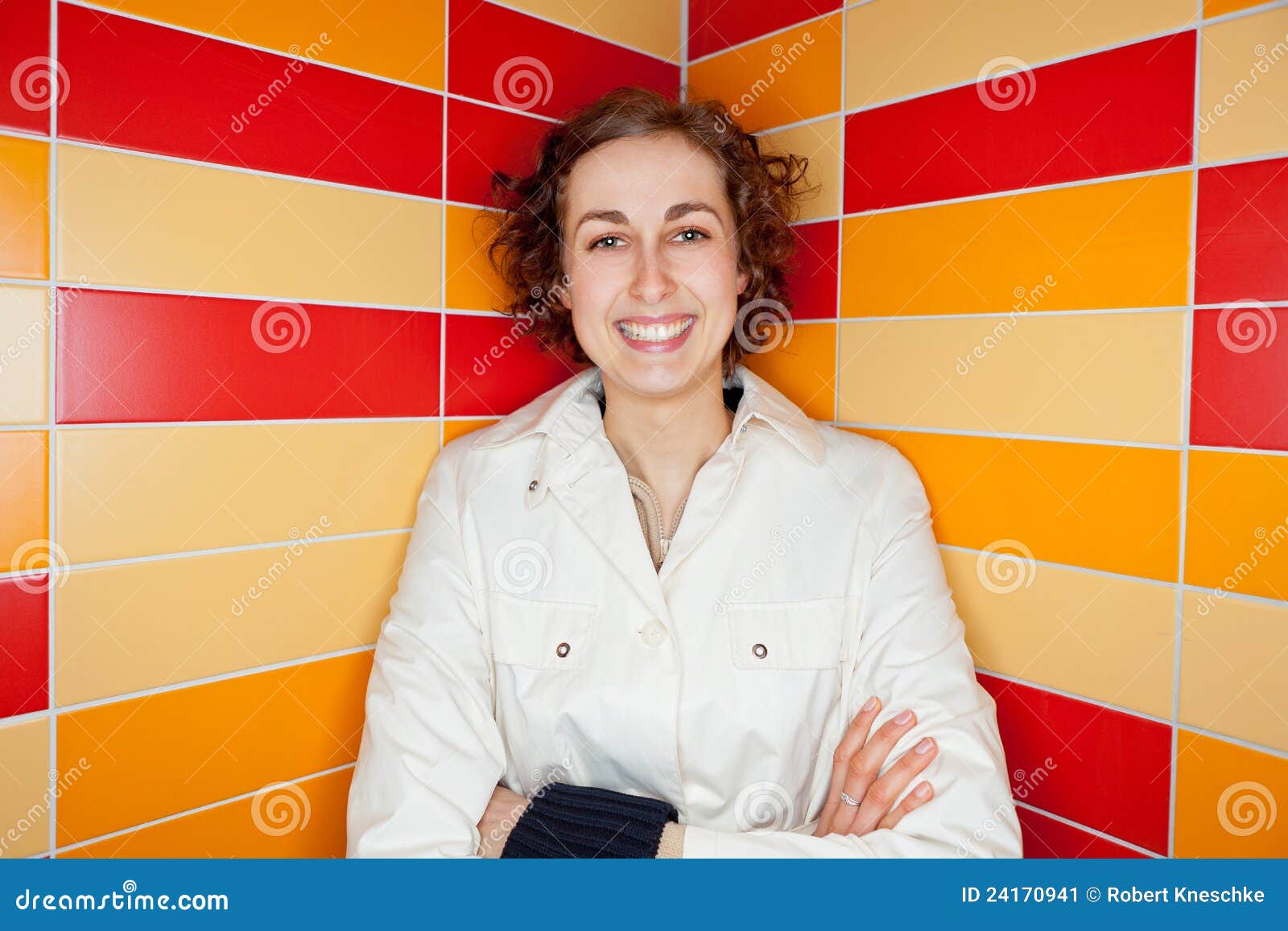 Smiling woman in corner stock image. Image of tiling - 24170941