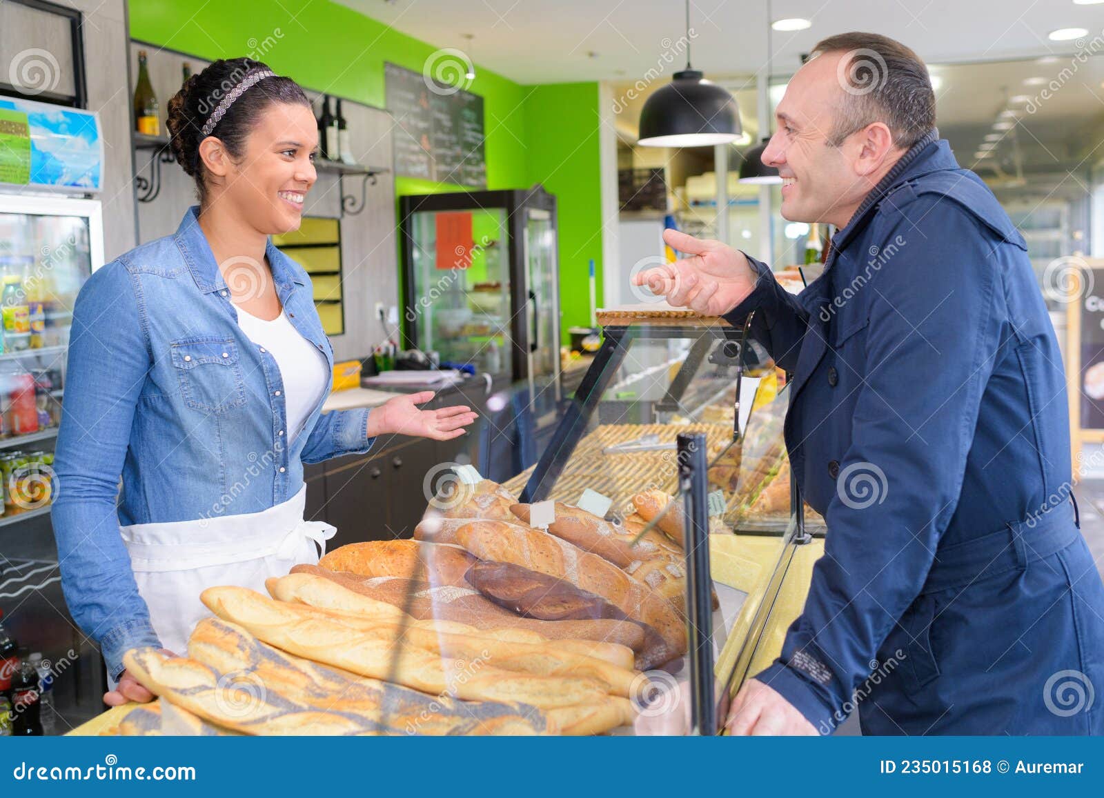 Smiling Woman and Customer in Bakery Stock Photo - Image of customer ...