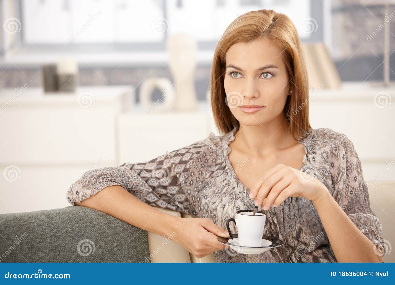 Smiling Woman Drinking Coffee Stock Photo - Image of american, couch ...