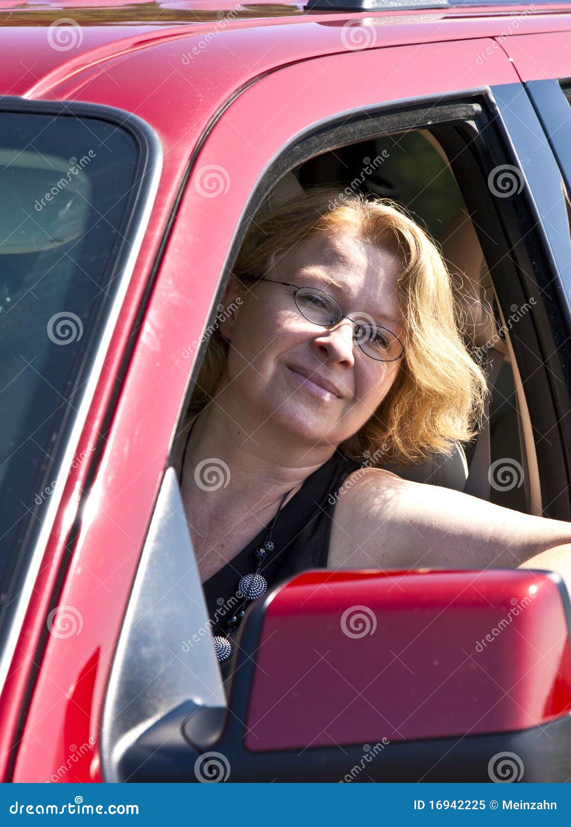 Smiling Woman Drives a Red Car Stock Image - Image of positive ...