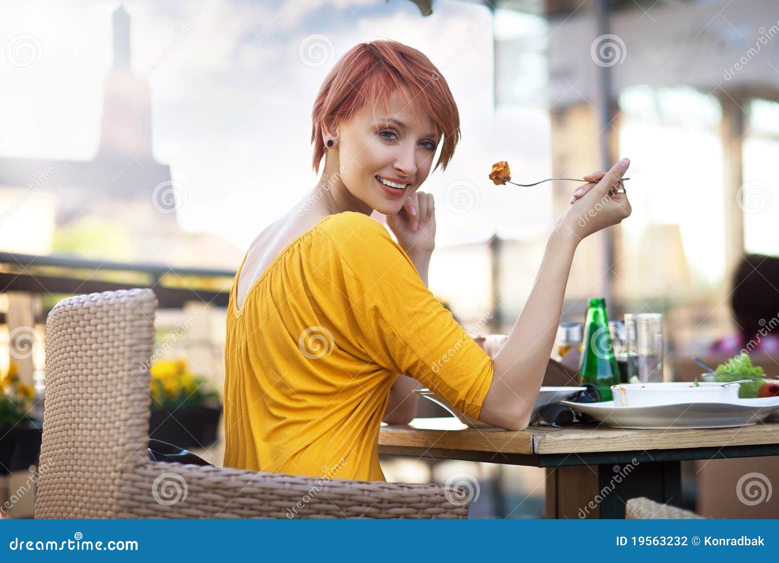 Smiling woman eating lunch stock photo. Image of cheerful - 19563232