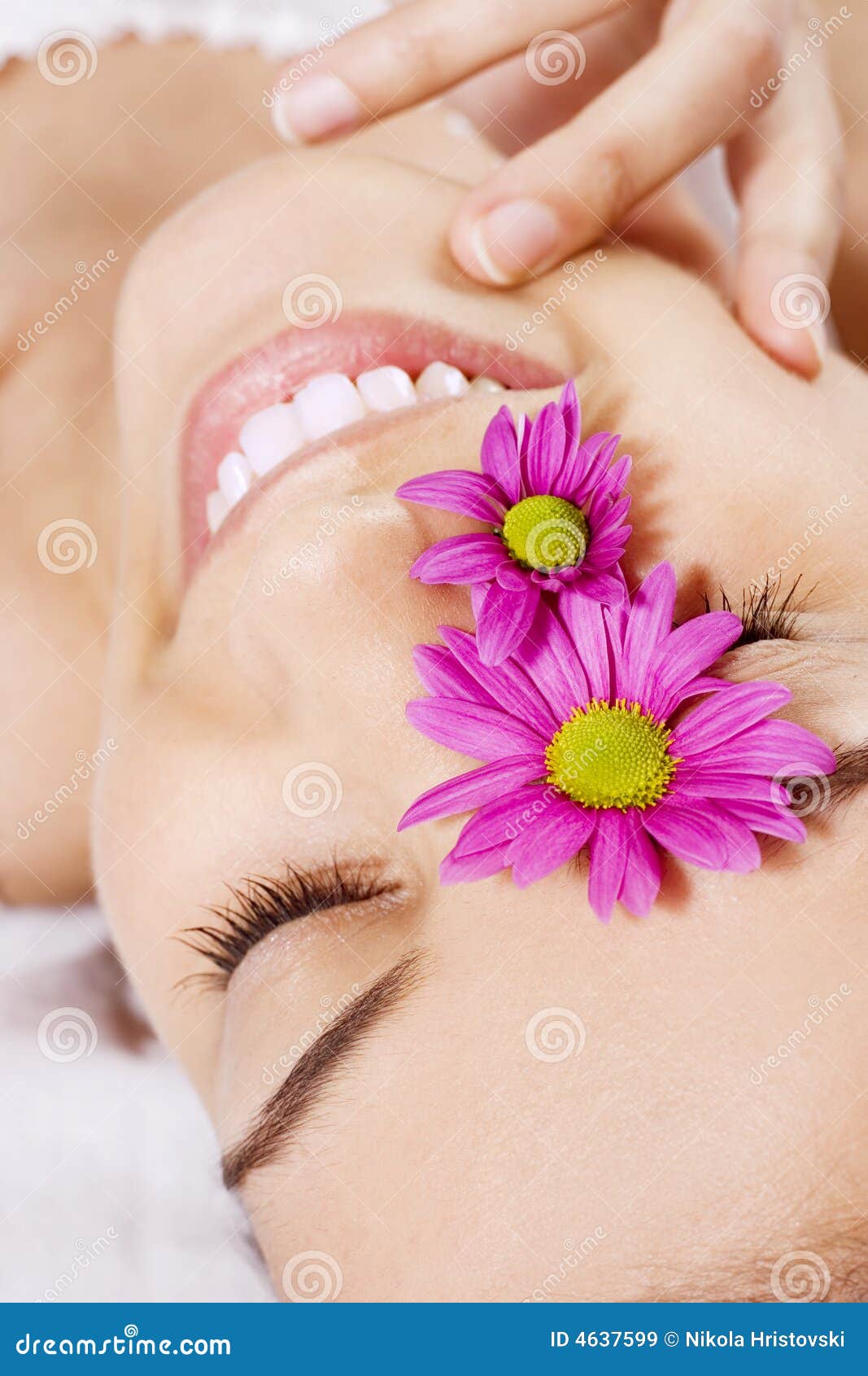 Smiling woman with flowers stock image. Image of serene - 4637599