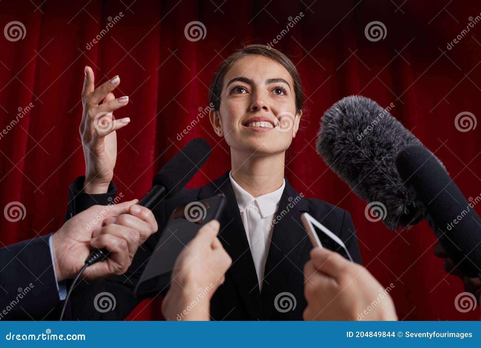 Smiling Woman Giving Interview To Journalists Stock Photo - Image of ... Smiling Woman Giving Interview To Journalists Stock Photo - Image of ...