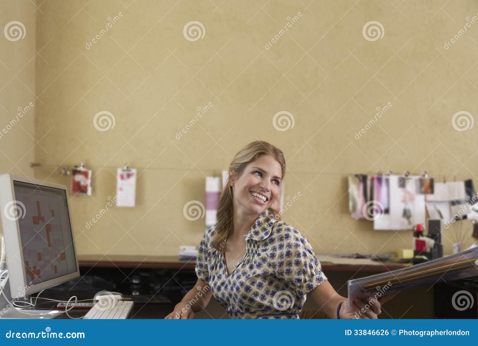 Smiling Woman Handing Off Documents Stock Photo - Image of blonde ...