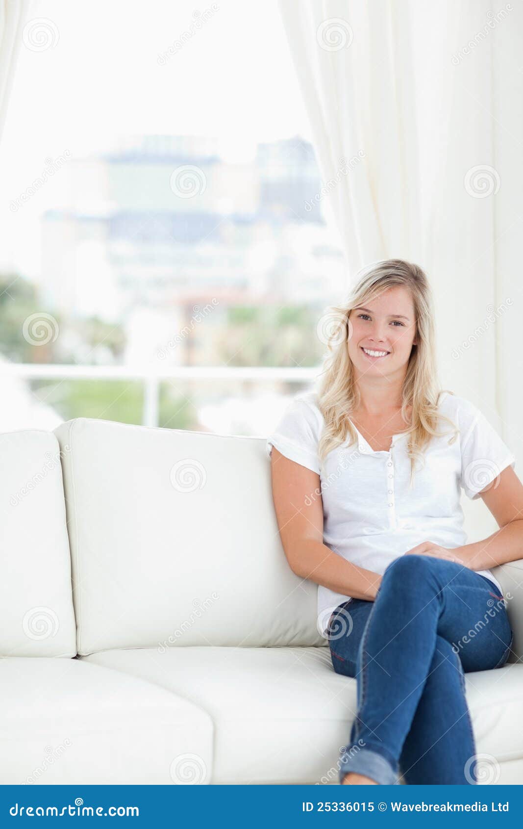 A Smiling Woman with Her Legs Crossed Stock Image - Image of happy ...