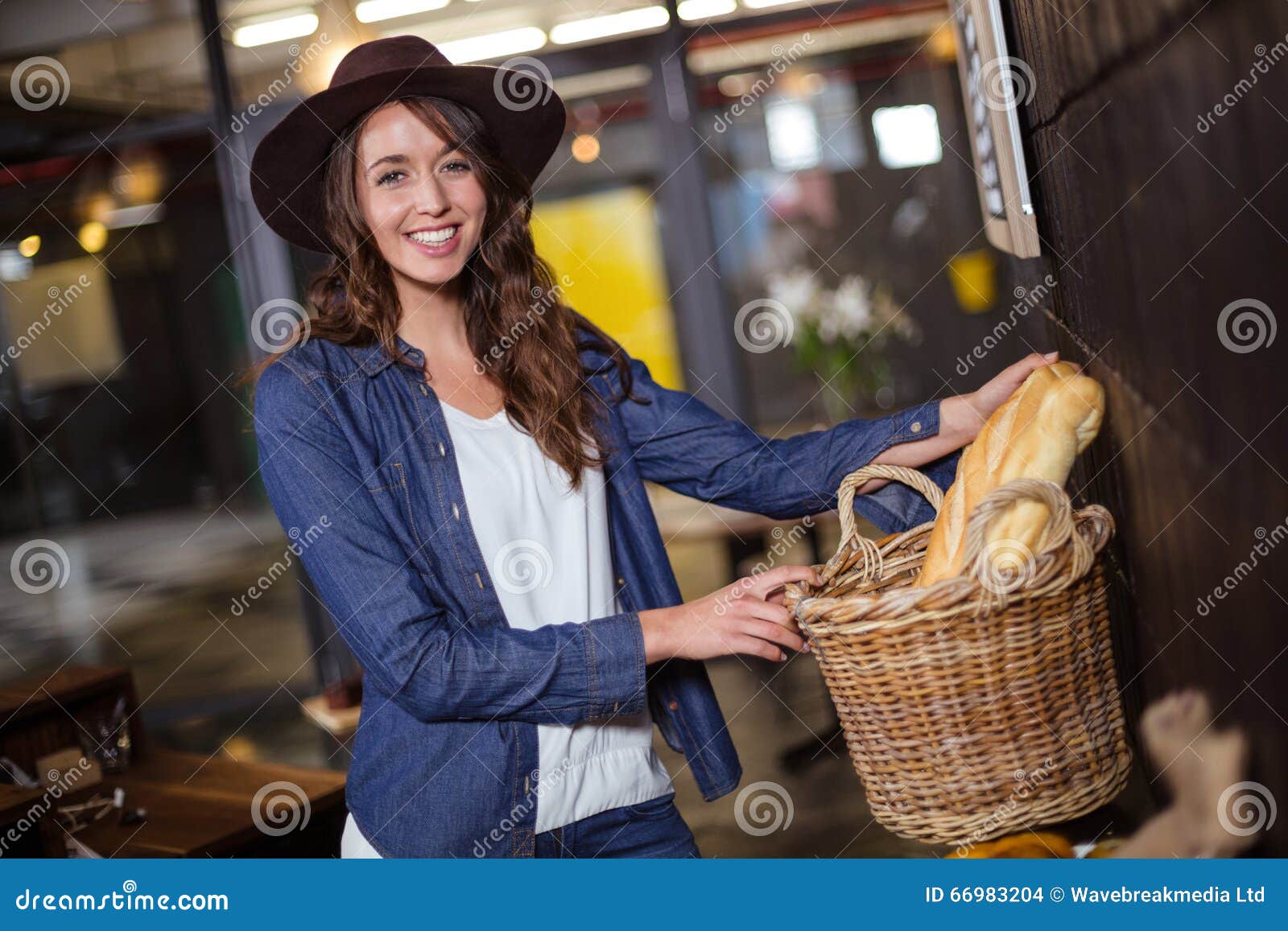 Smiling Woman Holding Bread Basket Stock Photo - Image of baguette ...
