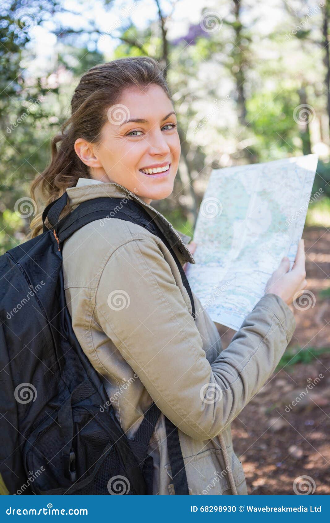 Smiling Woman Holding the Map Stock Photo - Image of exploration, calm ...