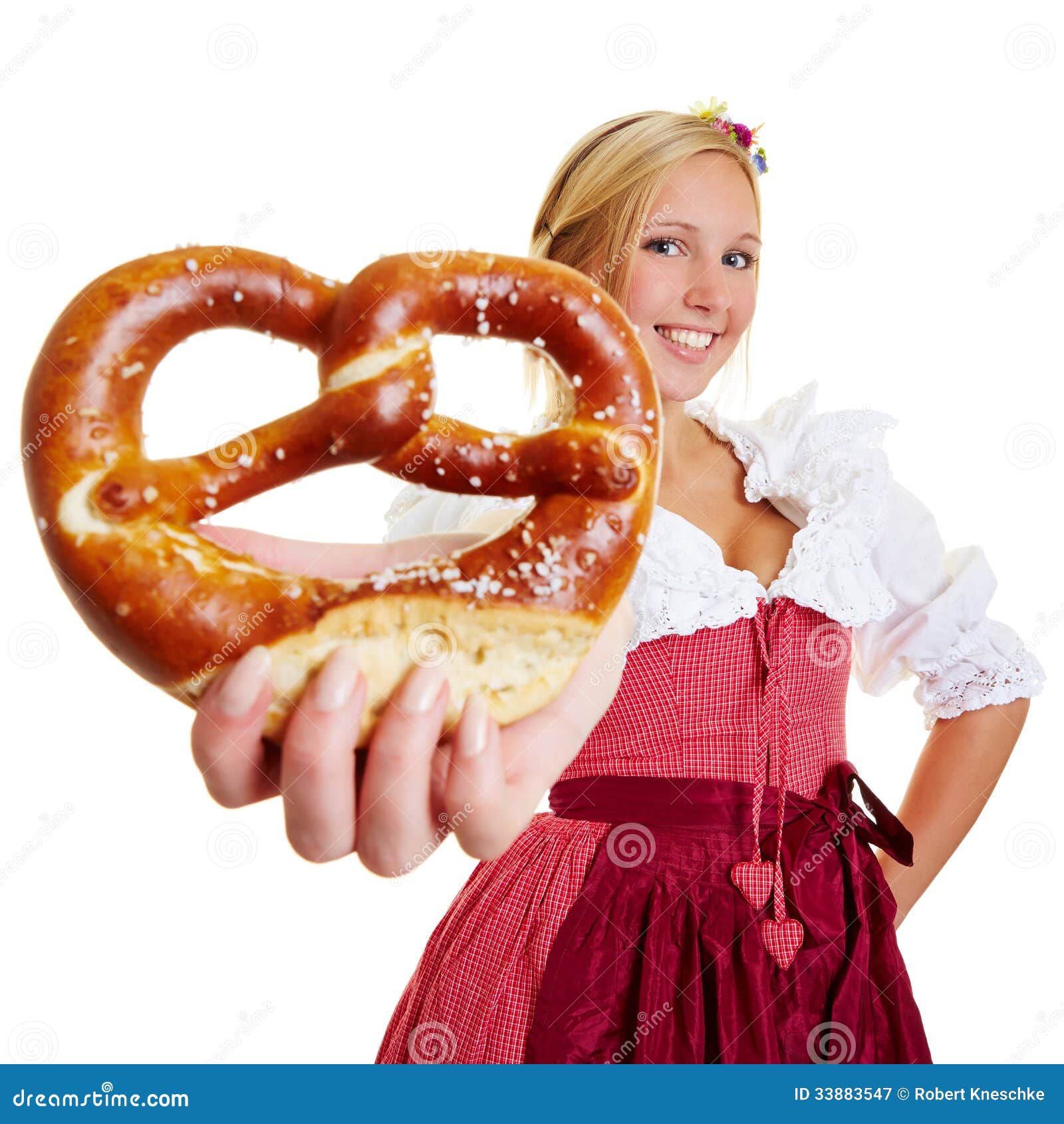 Smiling Woman Holding a Pretzel Stock Image - Image of offer, smile ...