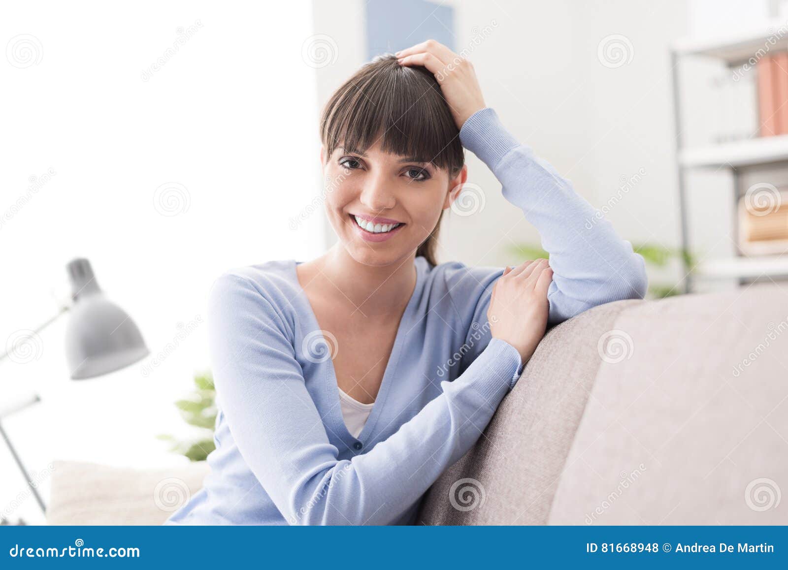 Smiling woman at home stock photo. Image of pretty, teen - 81668948