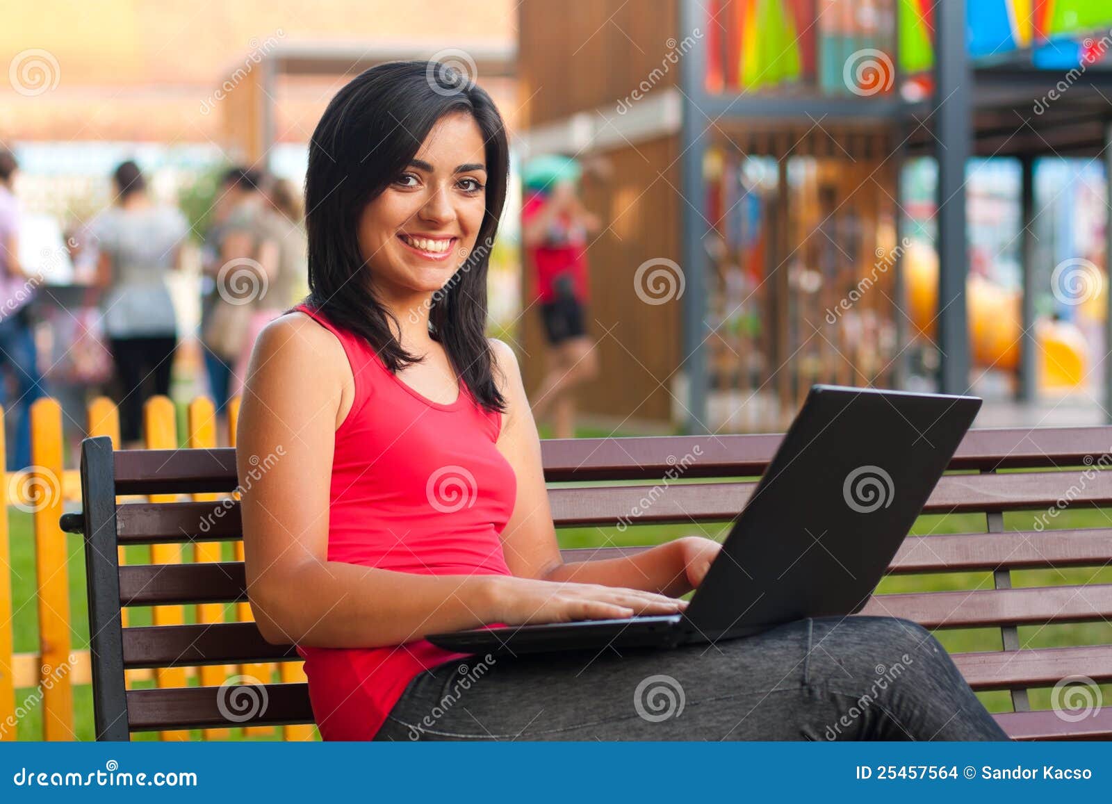 Smiling woman with laptop stock photo. Image of beautiful - 25457564