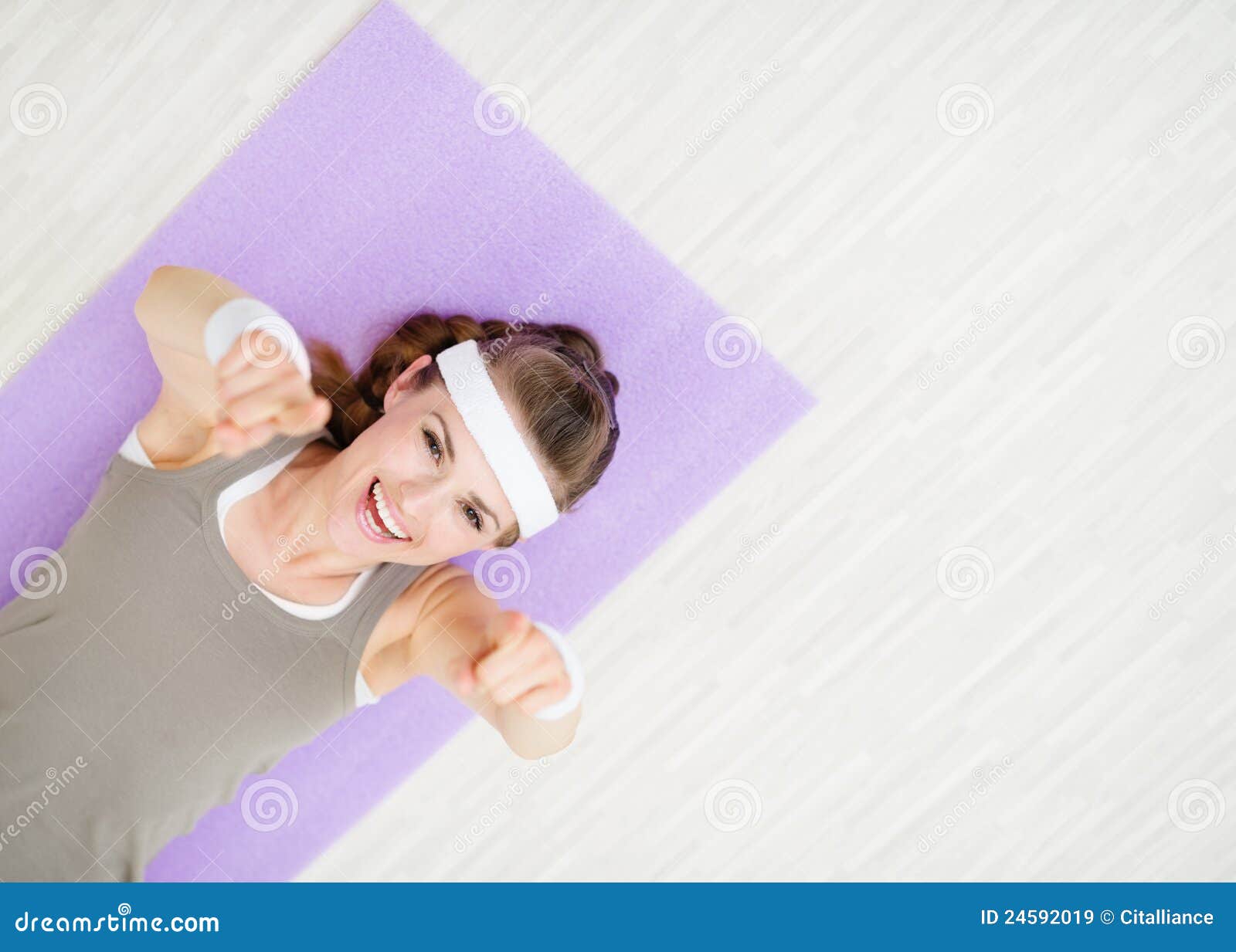 Smiling Woman Laying on Mat and Pointing on You Stock Image - Image of ...