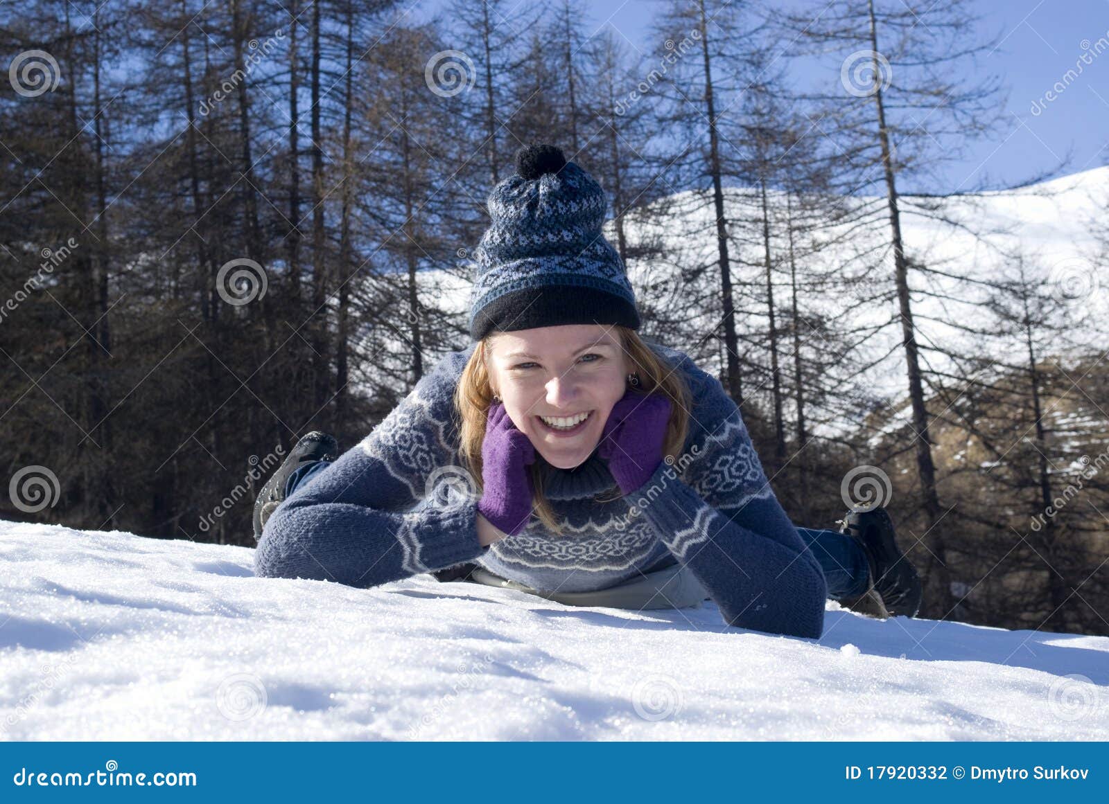 Smiling Woman Laying in Snow Stock Photo - Image of activities, emotion ...