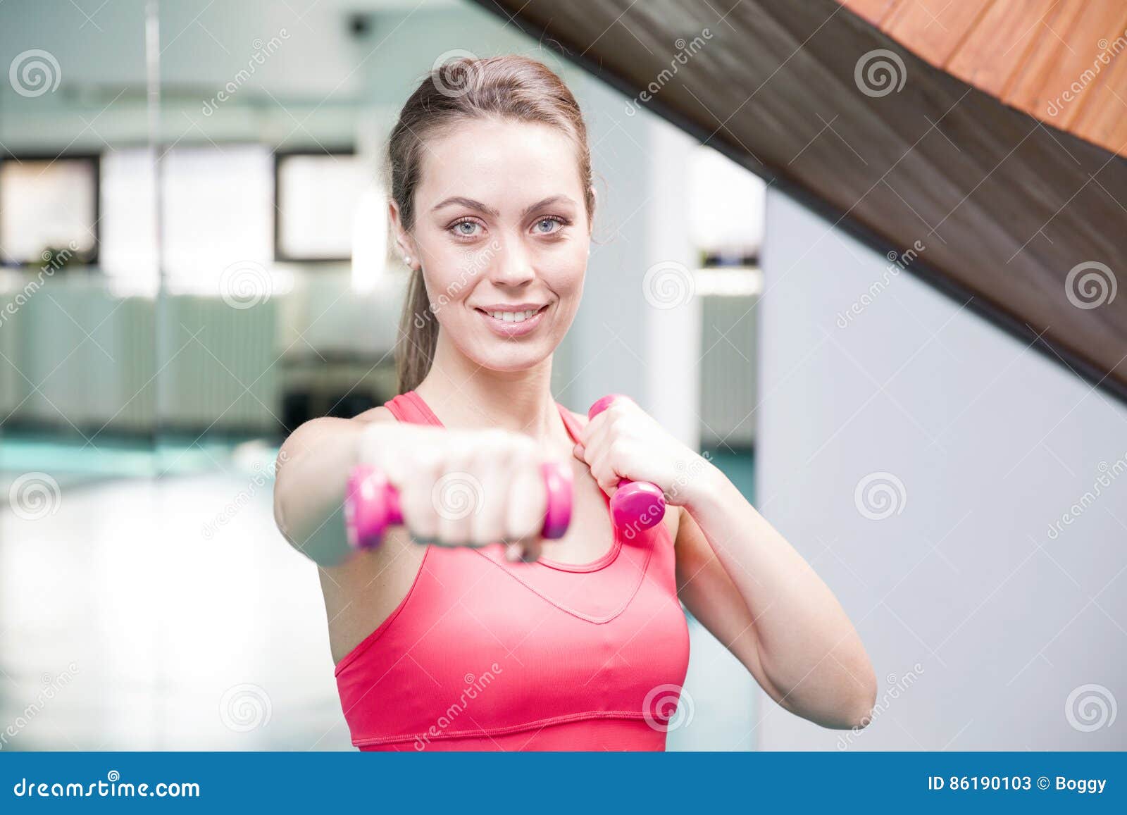 Smiling Woman Lifting Weights in the Gym Stock Image - Image of healthy ...