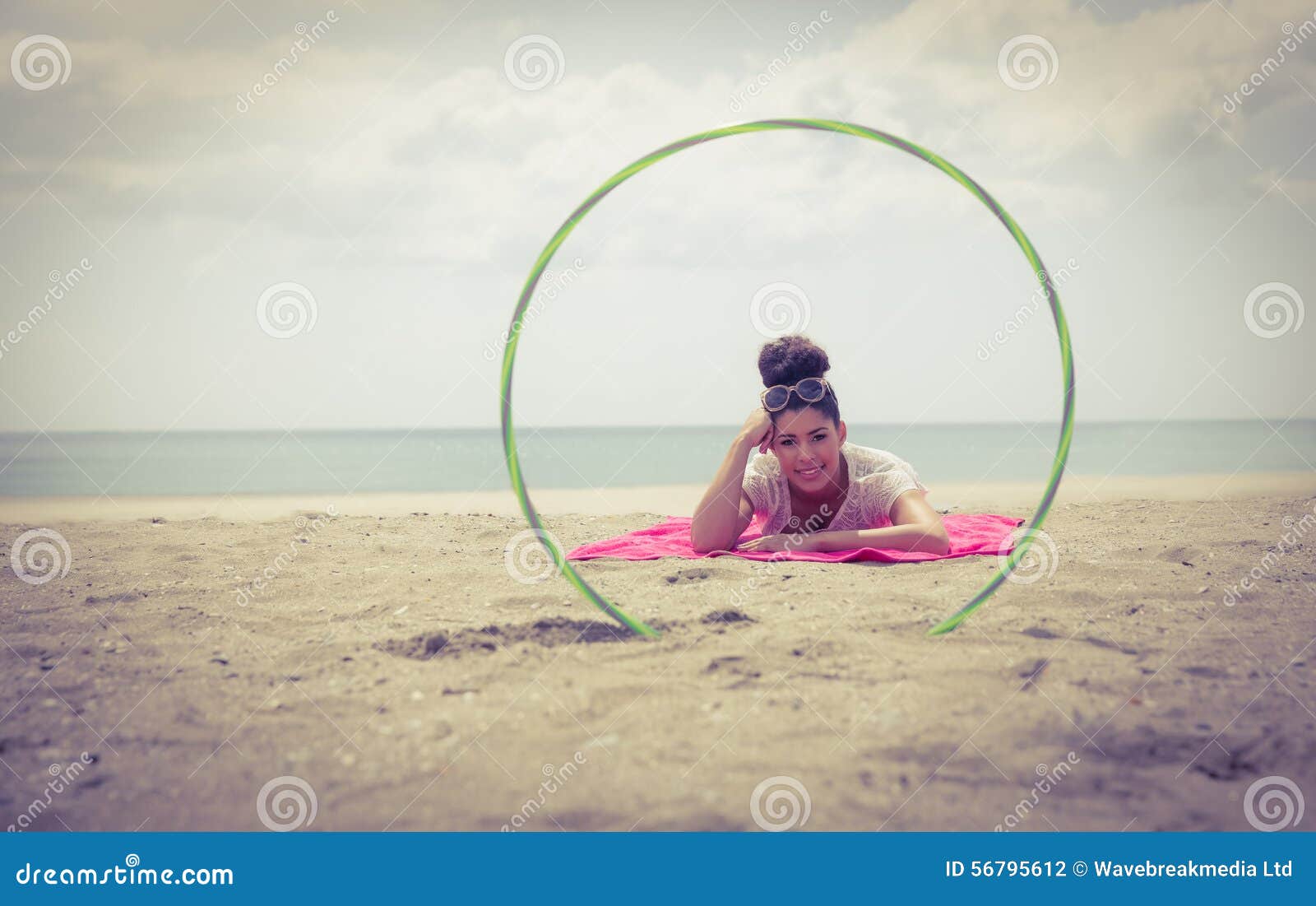 Smiling Woman Looking at Camera through Hula Hoop Stock Photo - Image ...