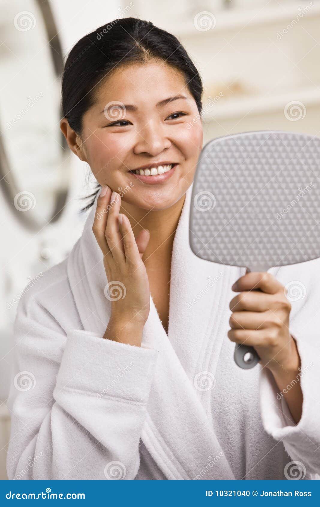Smiling Woman Looking in Mirror Stock Photo - Image of happiness ...