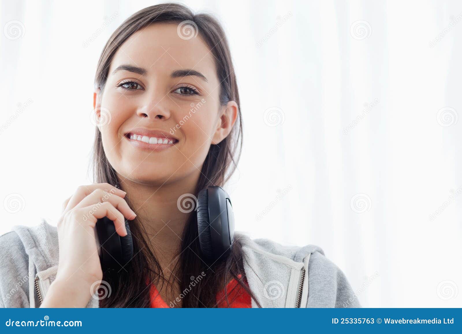 A Smiling Woman Looking Slightly Down into the Camera Stock Image ...