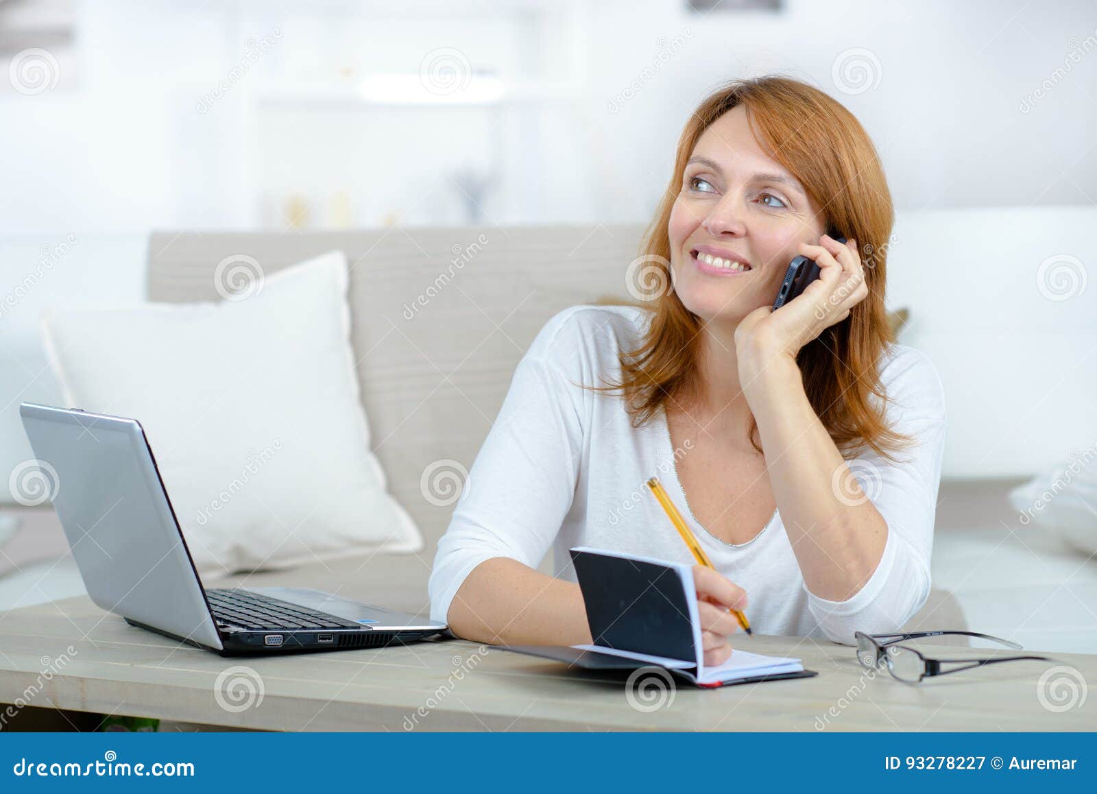 Smiling Woman Making Appointment in Diary Stock Image - Image of indoor ...