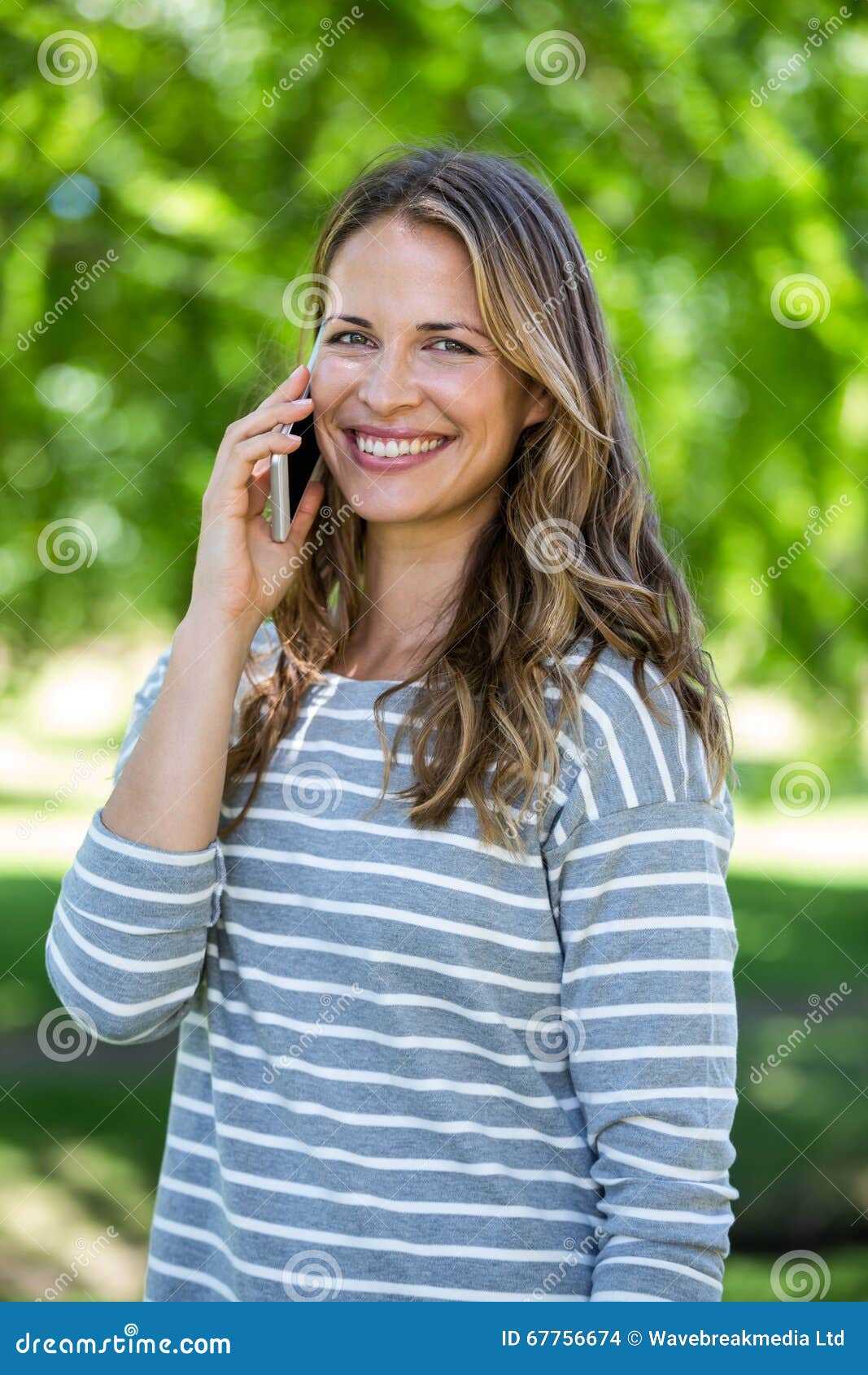 Smiling Woman Making a Phone Call Stock Photo - Image of calling, phone ...