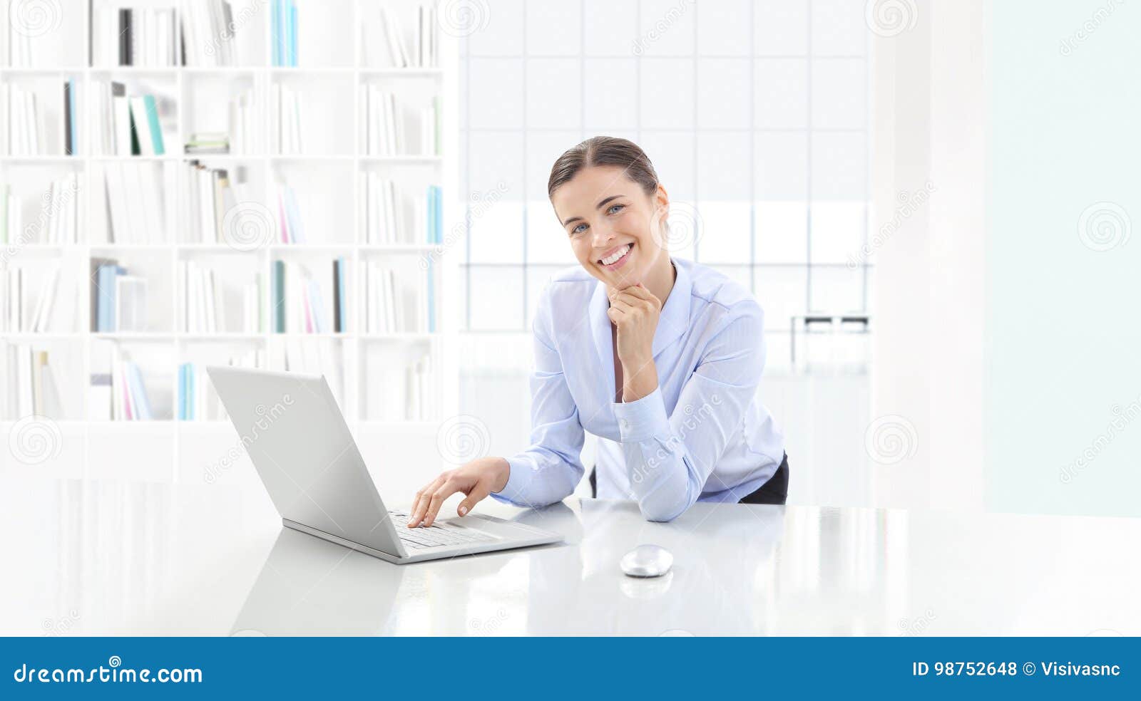 Smiling Woman in Office with Computer at Desk Stock Photo - Image of ...