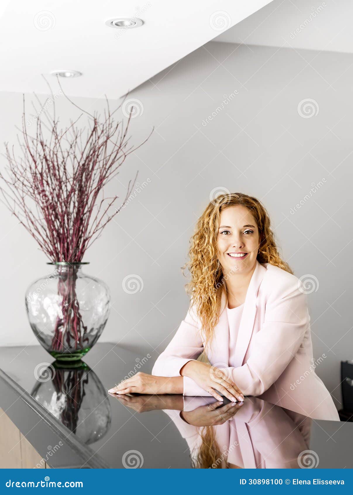 Smiling Woman at Office Reception Stock Photo - Image of decor ...