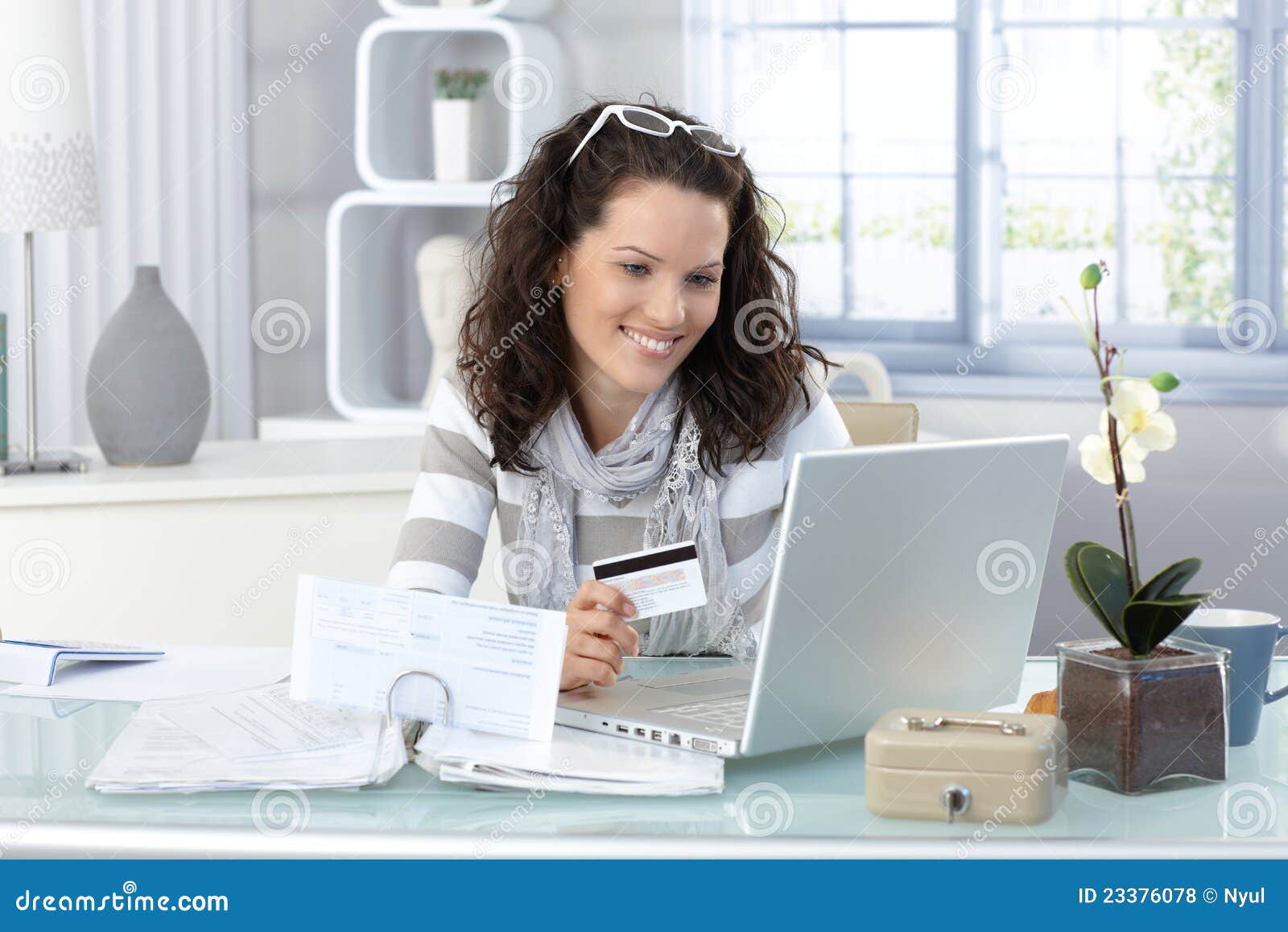 Smiling Woman Paying Online Stock Photo - Image of casual, happiness ...