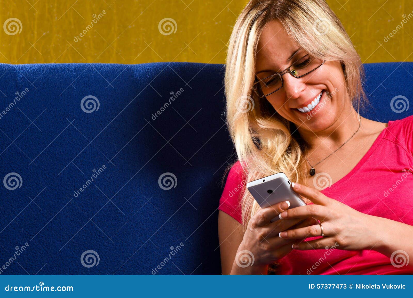 Smiling woman with phone stock image. Image of cheerful - 57377473