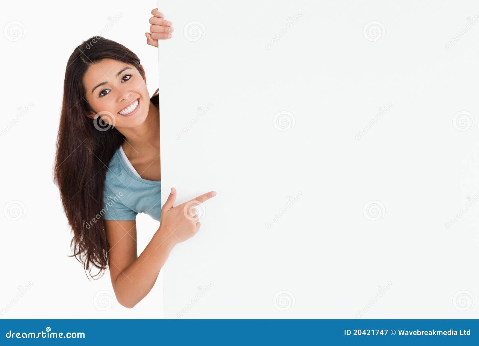 Smiling Woman Pointing at a Board Stock Image - Image of background ...