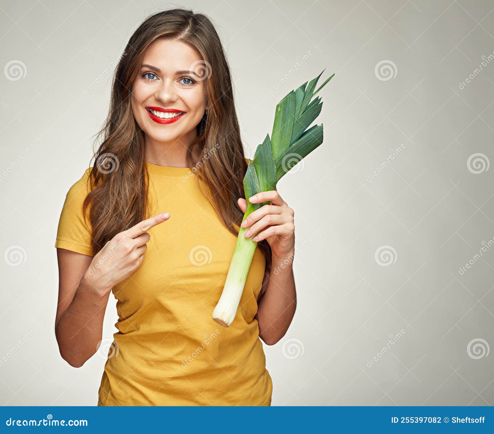 Smiling Woman Pointing Finger on Green Leek Stock Photo - Image of ... Smiling Woman Pointing Finger on Green Leek Stock Photo - Image of ...