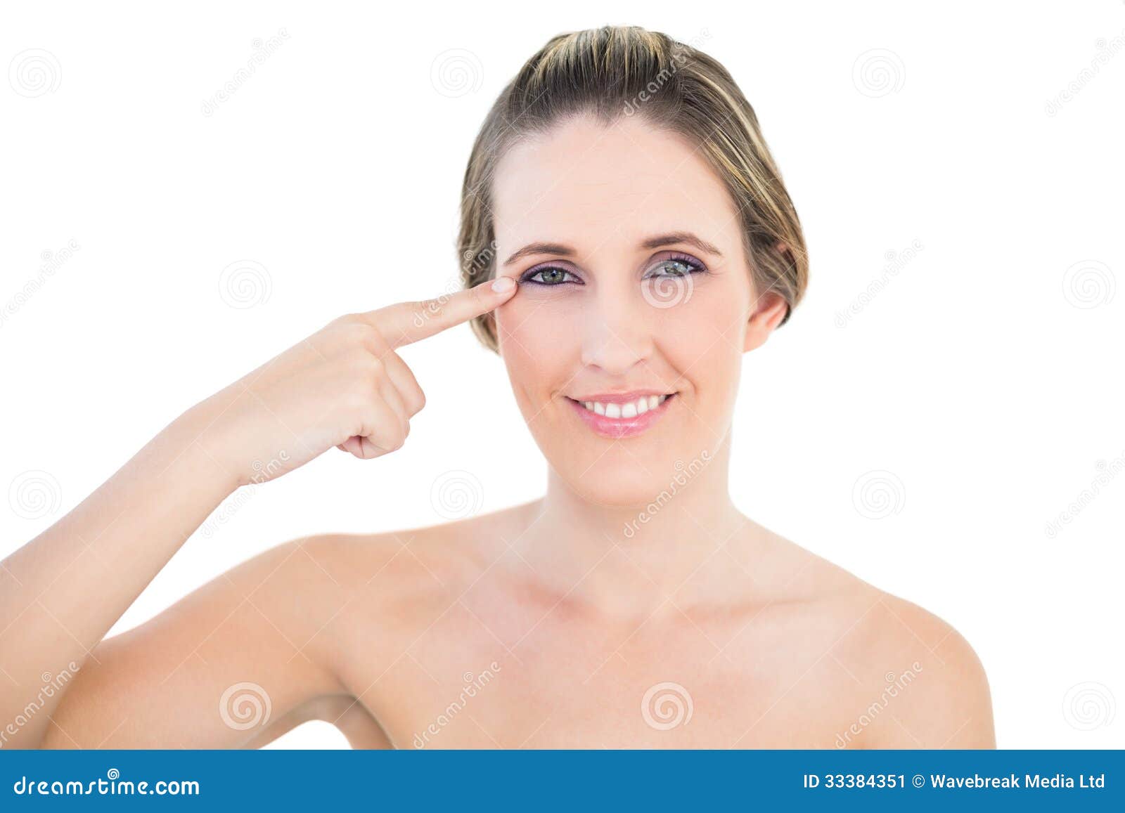 Smiling Woman Pointing at Her Eye Stock Image - Image of white, natural ...