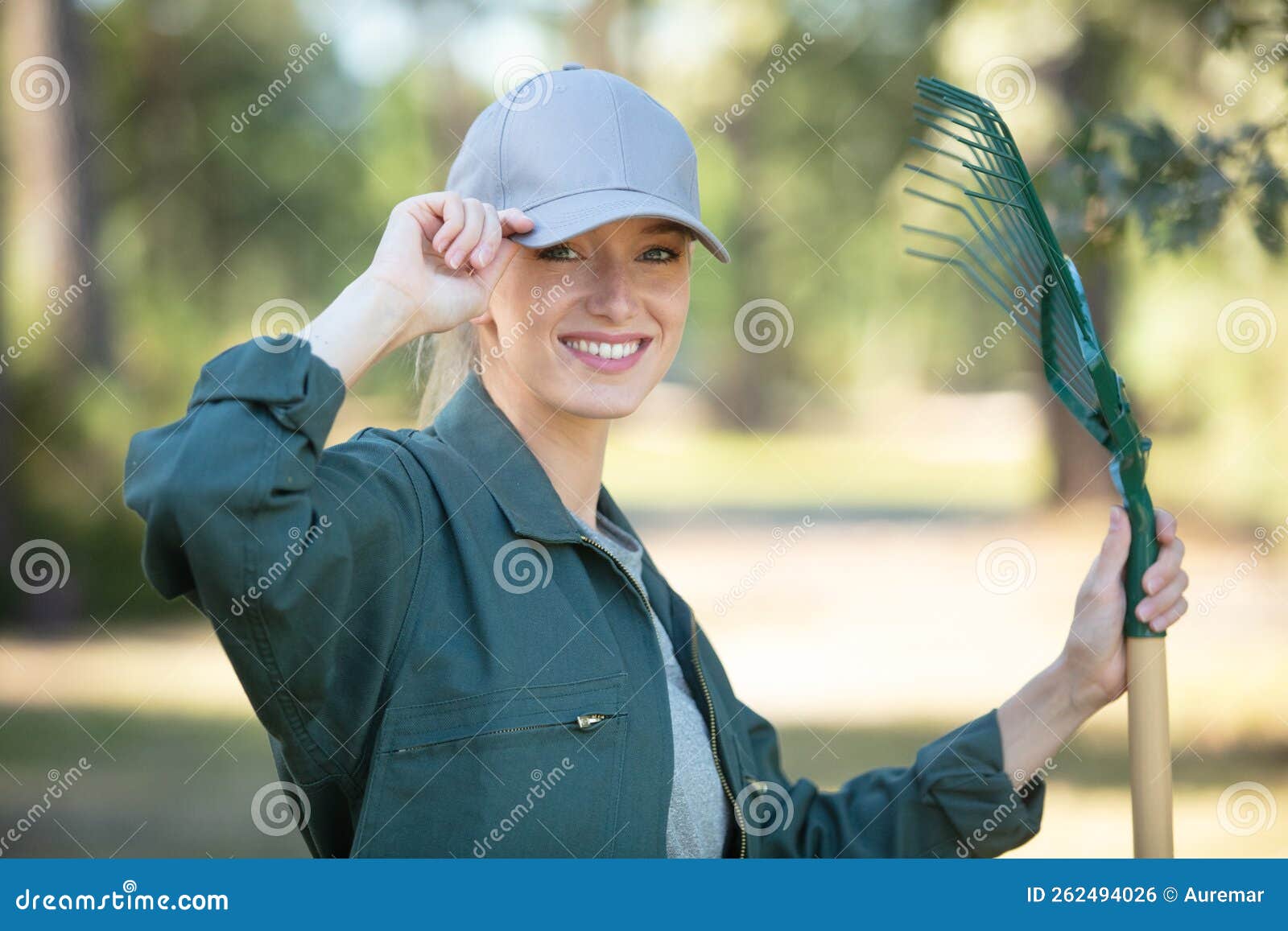 Smiling Woman Posing with Rake Stock Photo - Image of hobby, enjoying ...