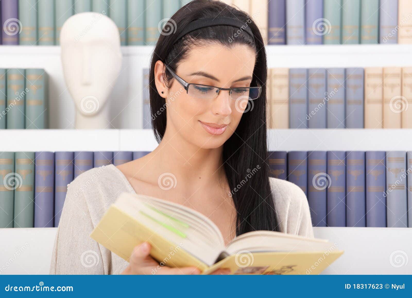 Smiling woman reading stock image. Image of home, book - 18317623