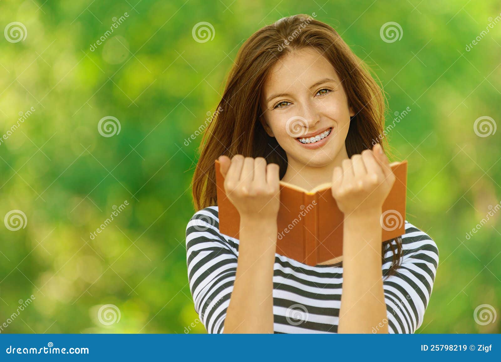Smiling woman reading book stock image. Image of learning - 25798219