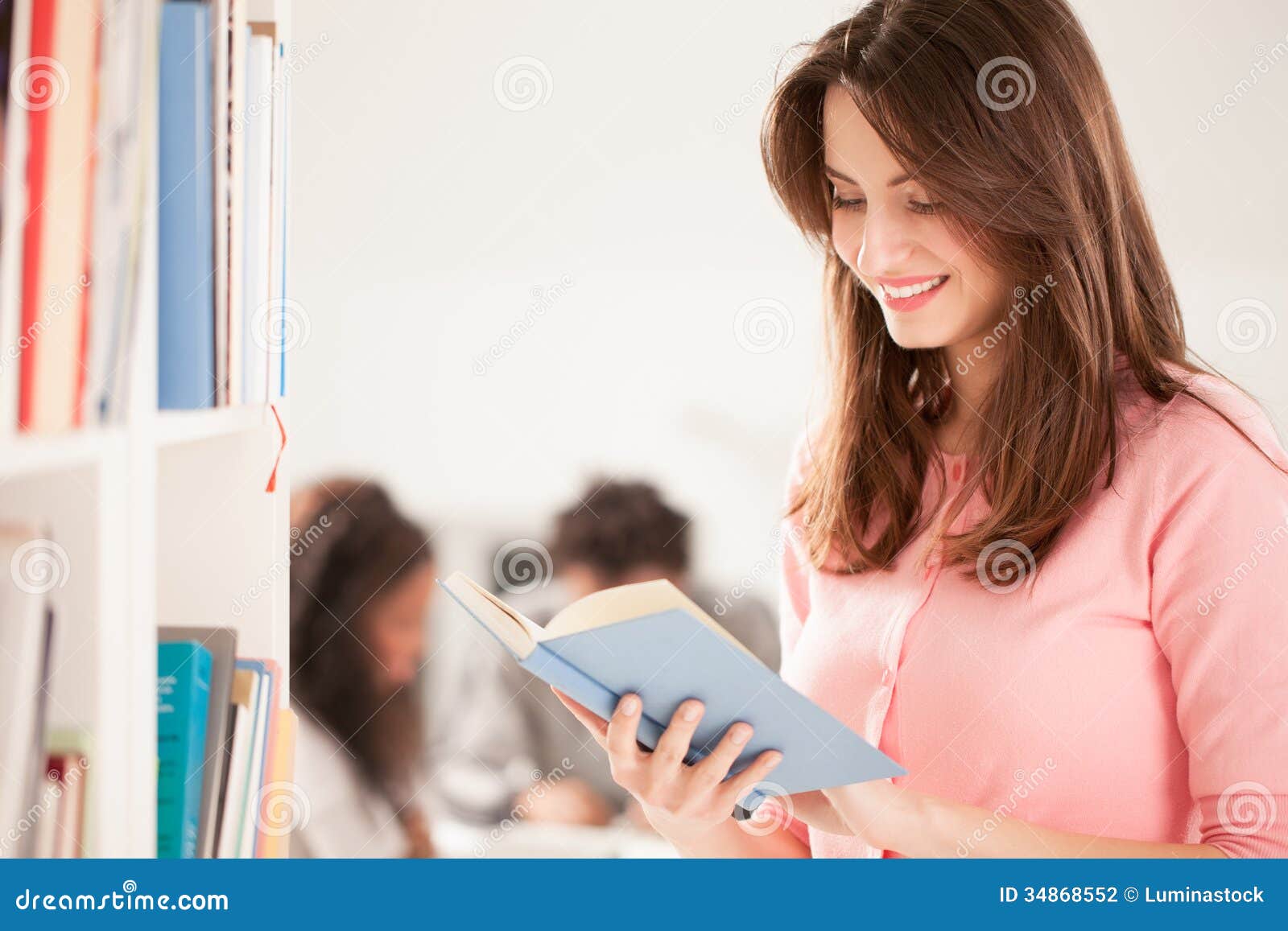 Smiling Woman Reading a Book Stock Photo - Image of university, black ...