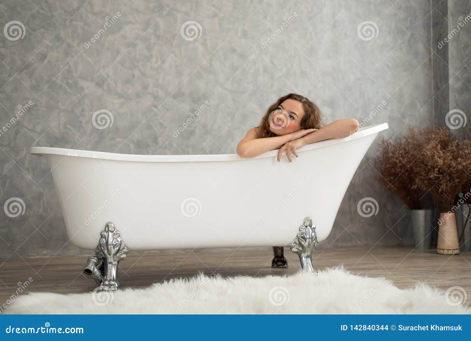 Smiling Woman Relaxing in Bathtub Stock Photo - Image of person ...