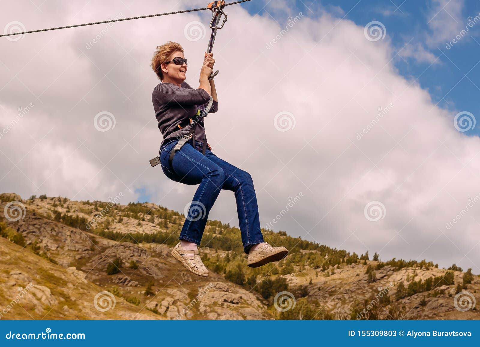 Smiling Woman Rides on a Bungee Stock Image - Image of exciting ...