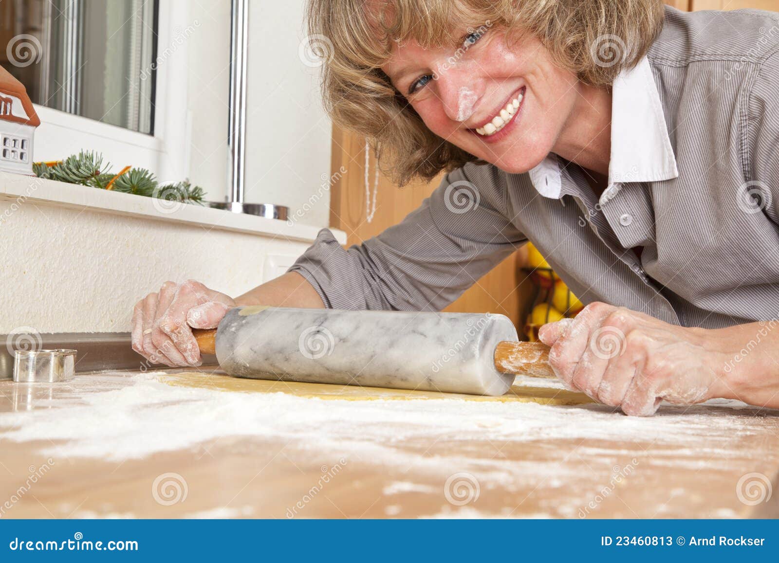 Smiling Woman Rolling Dough Stock Image - Image of beauty, blond: 23460813