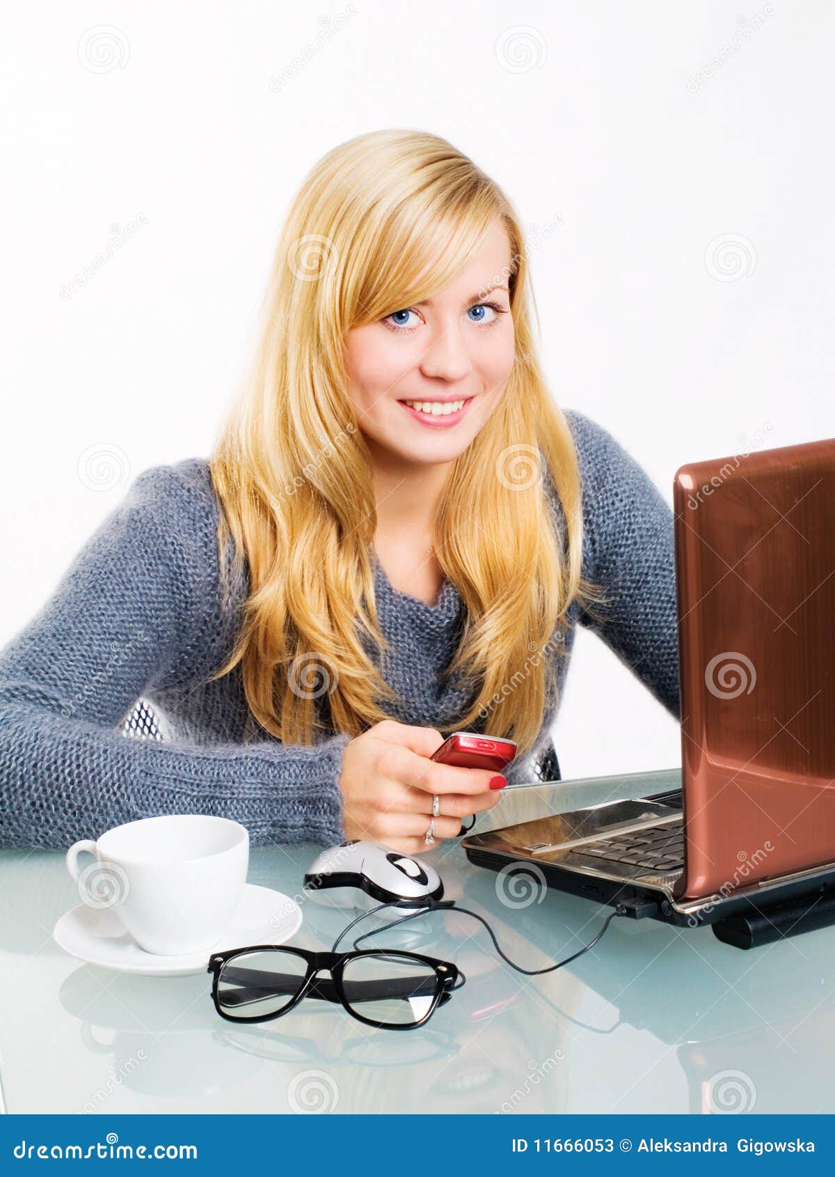 Smiling Woman Sitting with Computer and Phone Stock Image - Image of ...