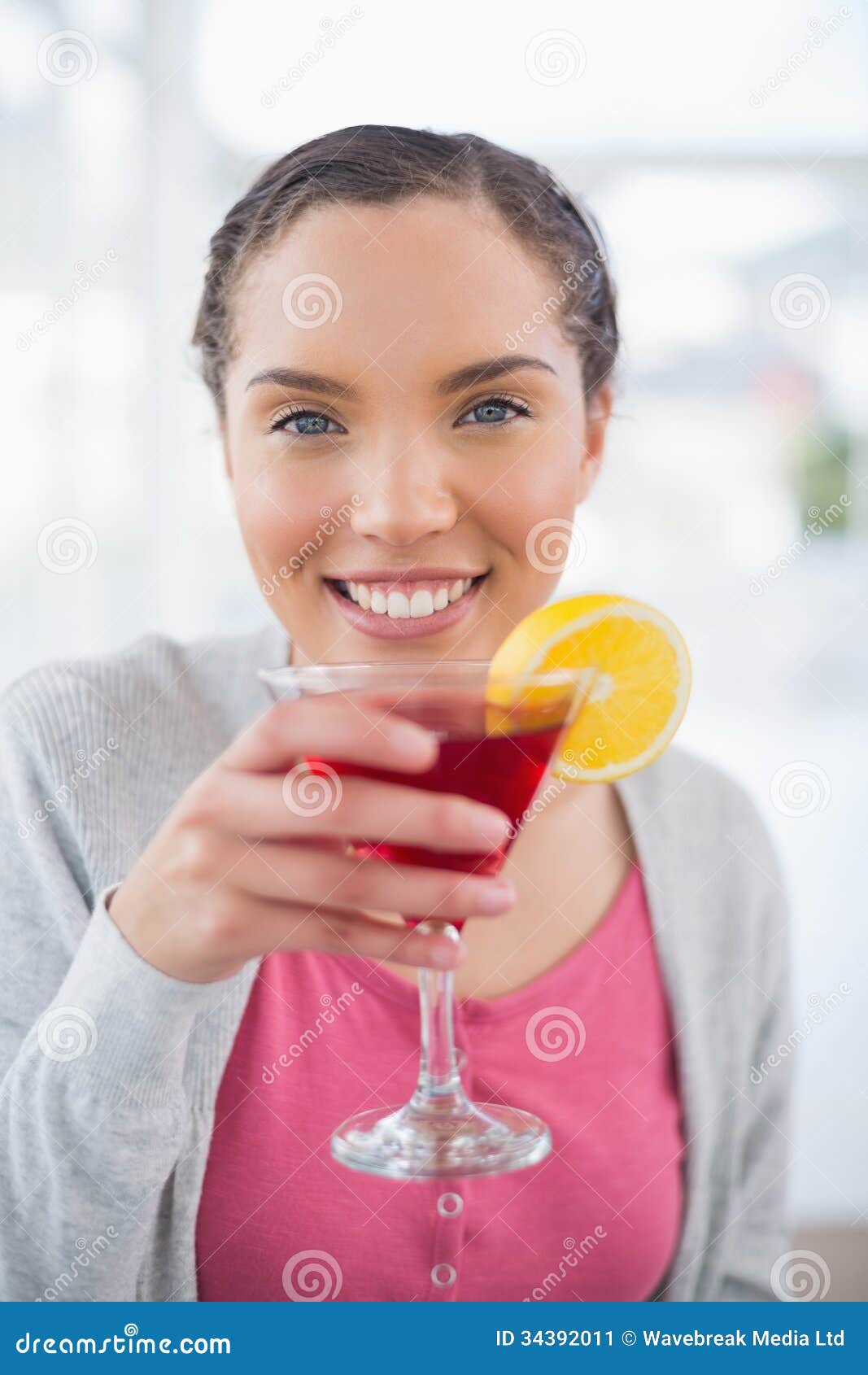 Smiling Woman Sitting on Sofa and Drinking Cocktail Stock Image - Image ...