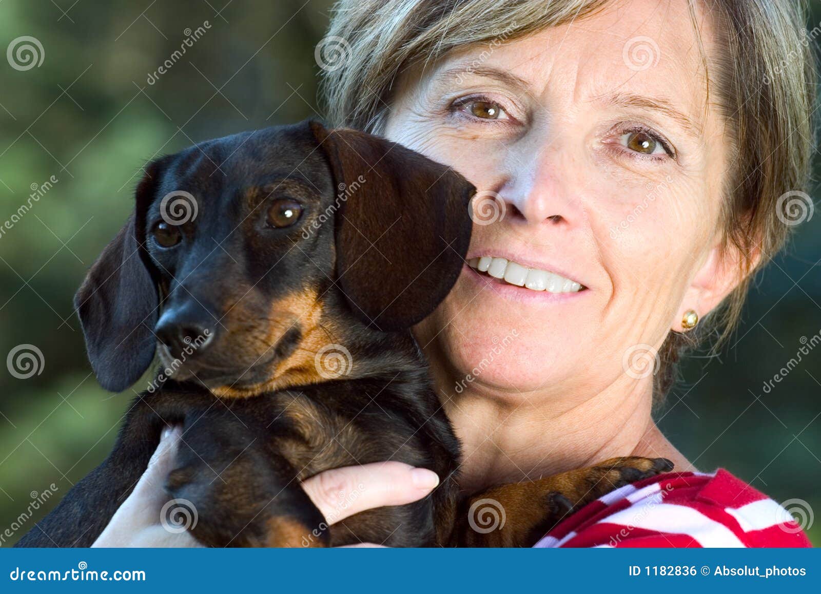 Smiling Woman and Small Dog Stock Photo - Image of mature, outdoors ...