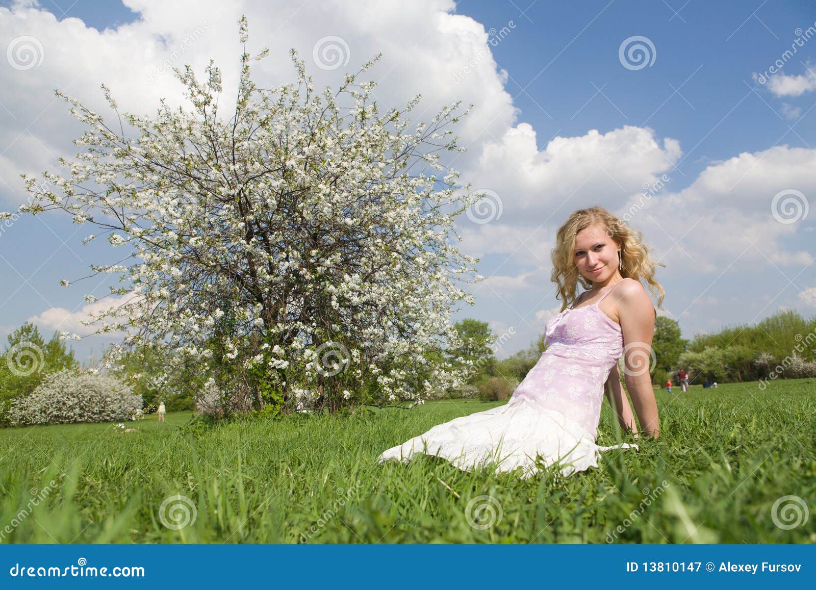Smiling woman at spring stock image. Image of garden - 13810147