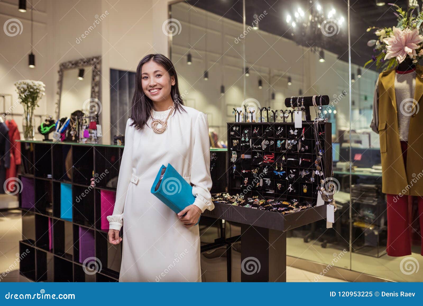Smiling woman in the store stock image. Image of fashion - 120953225