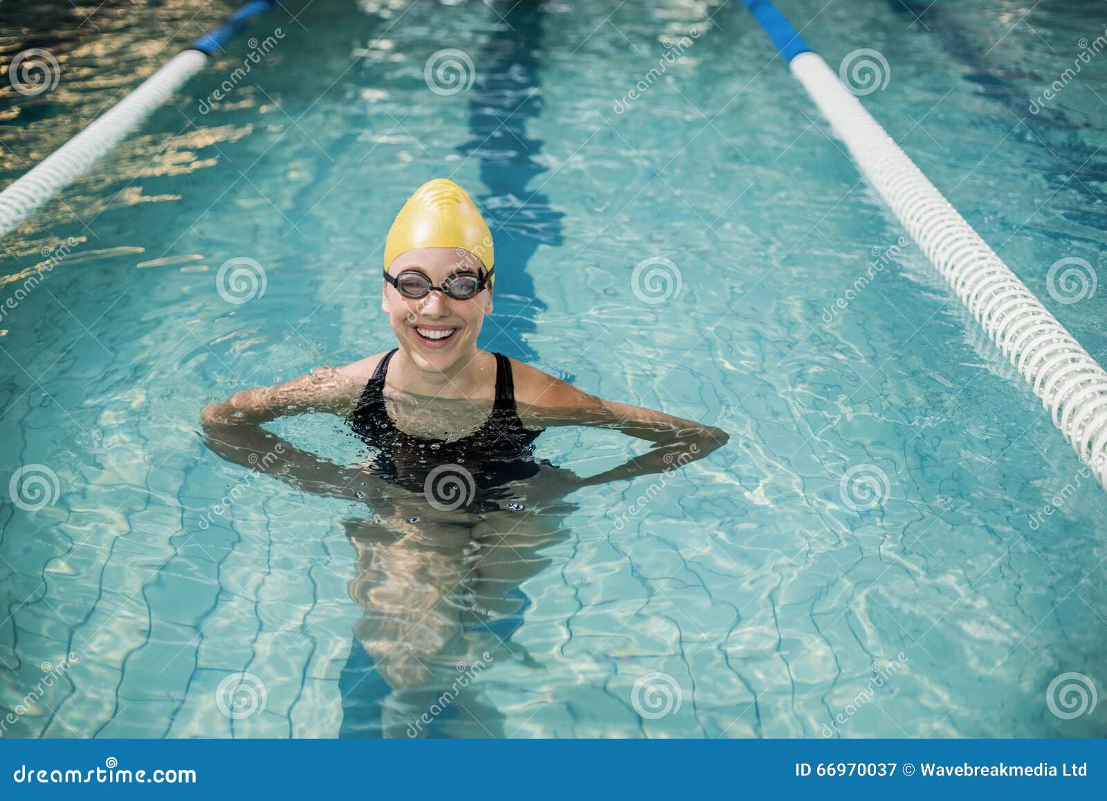 Smiling woman in swimsuit stock image. Image of smiling - 66970037