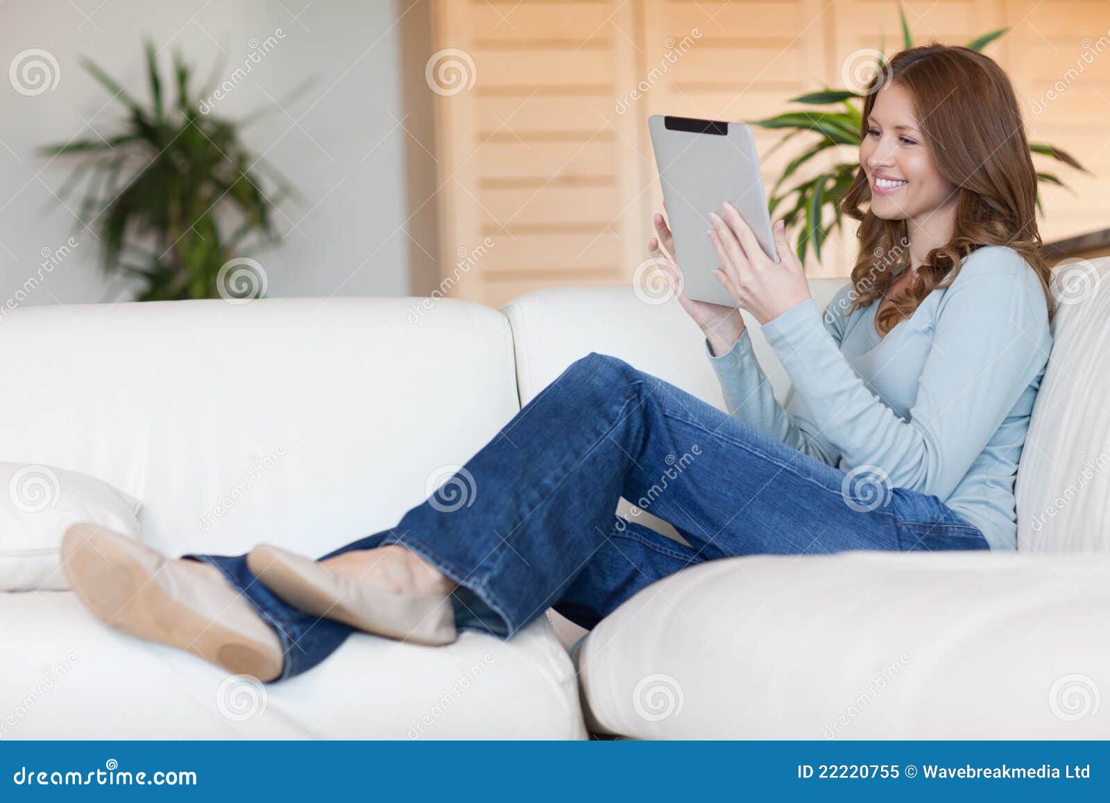 Smiling woman with tablet stock image. Image of person - 22220755
