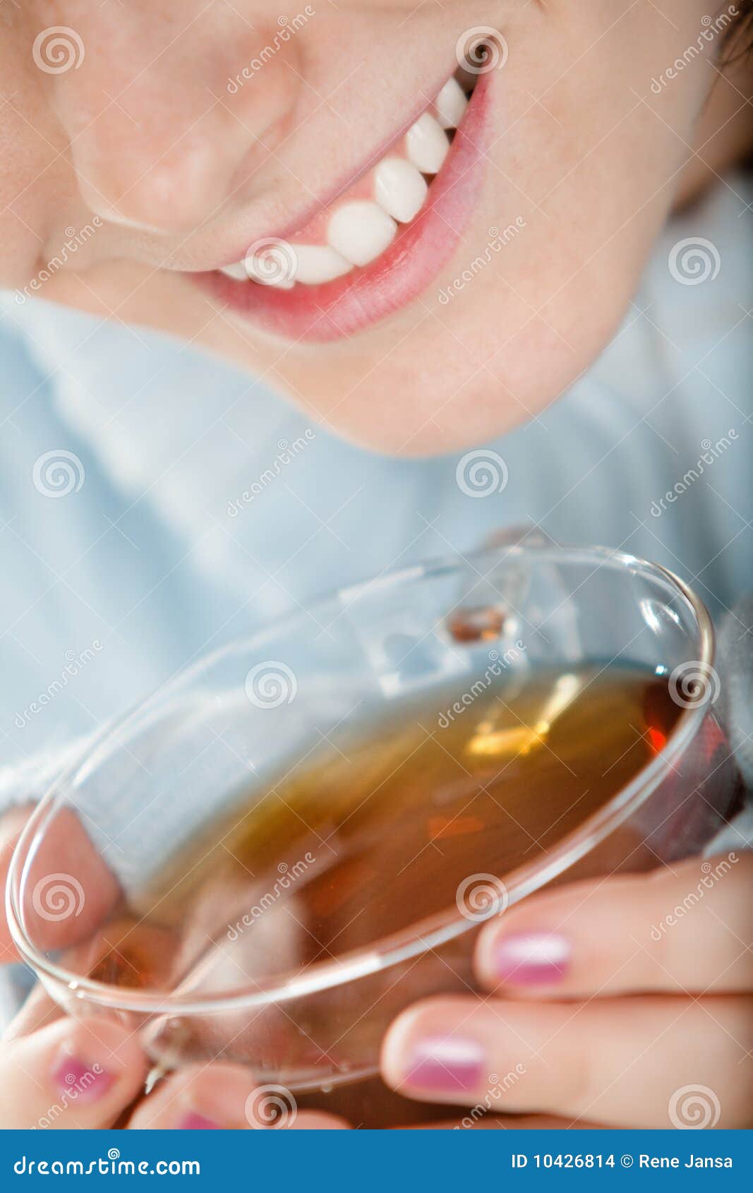 Smiling woman with tea cup stock photo. Image of refreshing - 10426814