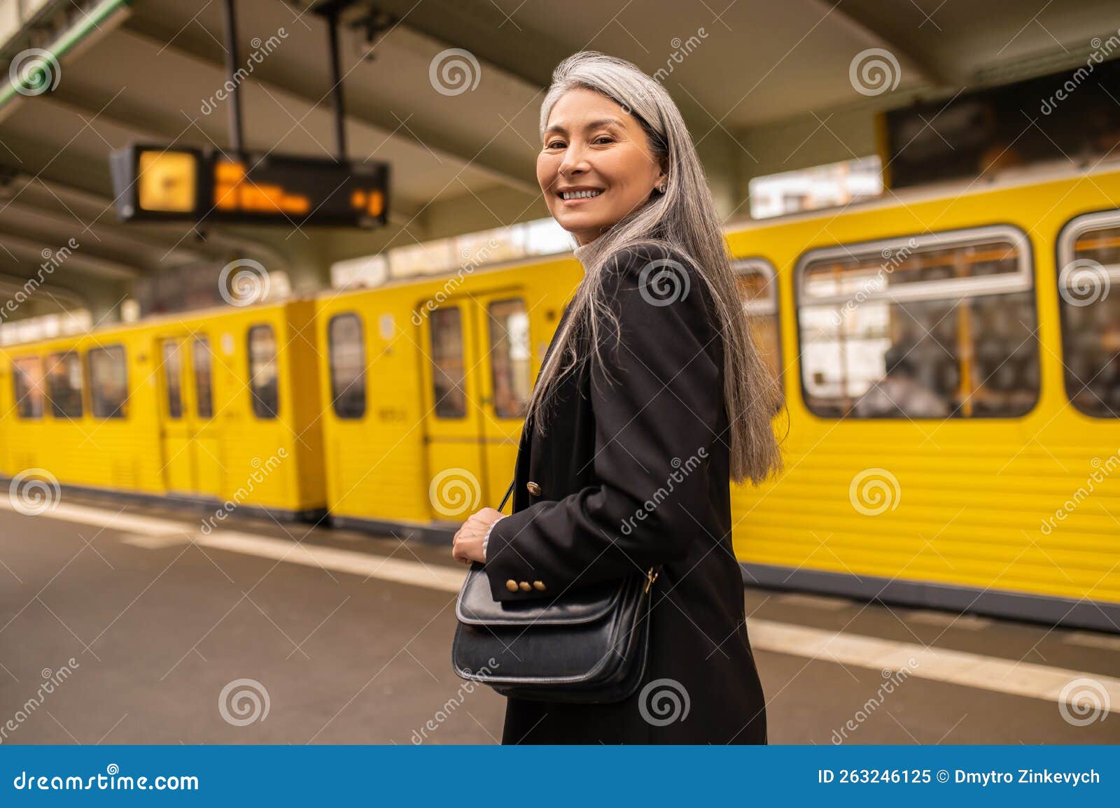 Smiling Woman on a Train Platform Stock Image - Image of transport ...